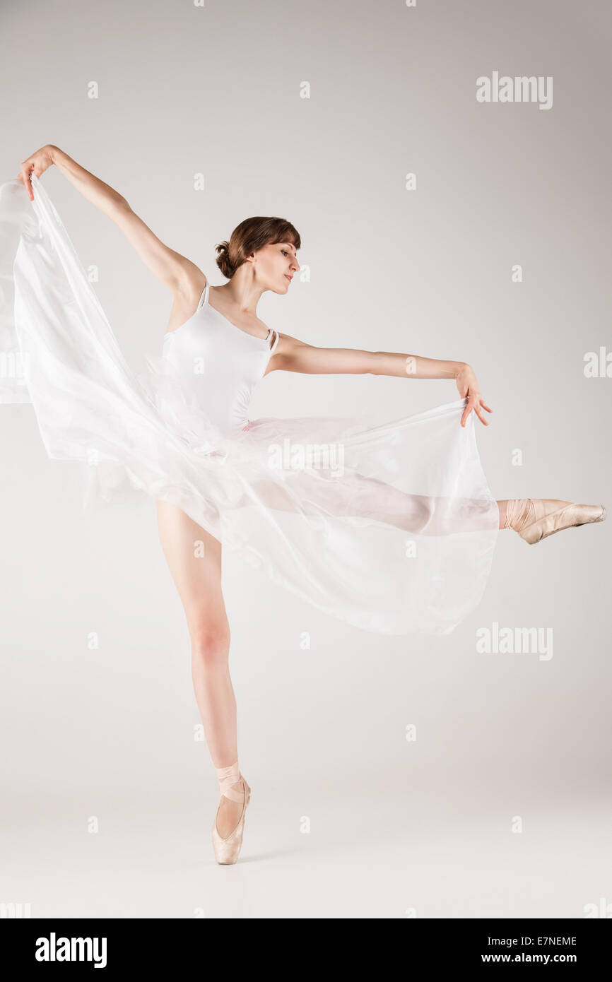 Ballet dancer in white tutu posing Stock Photo - Alamy