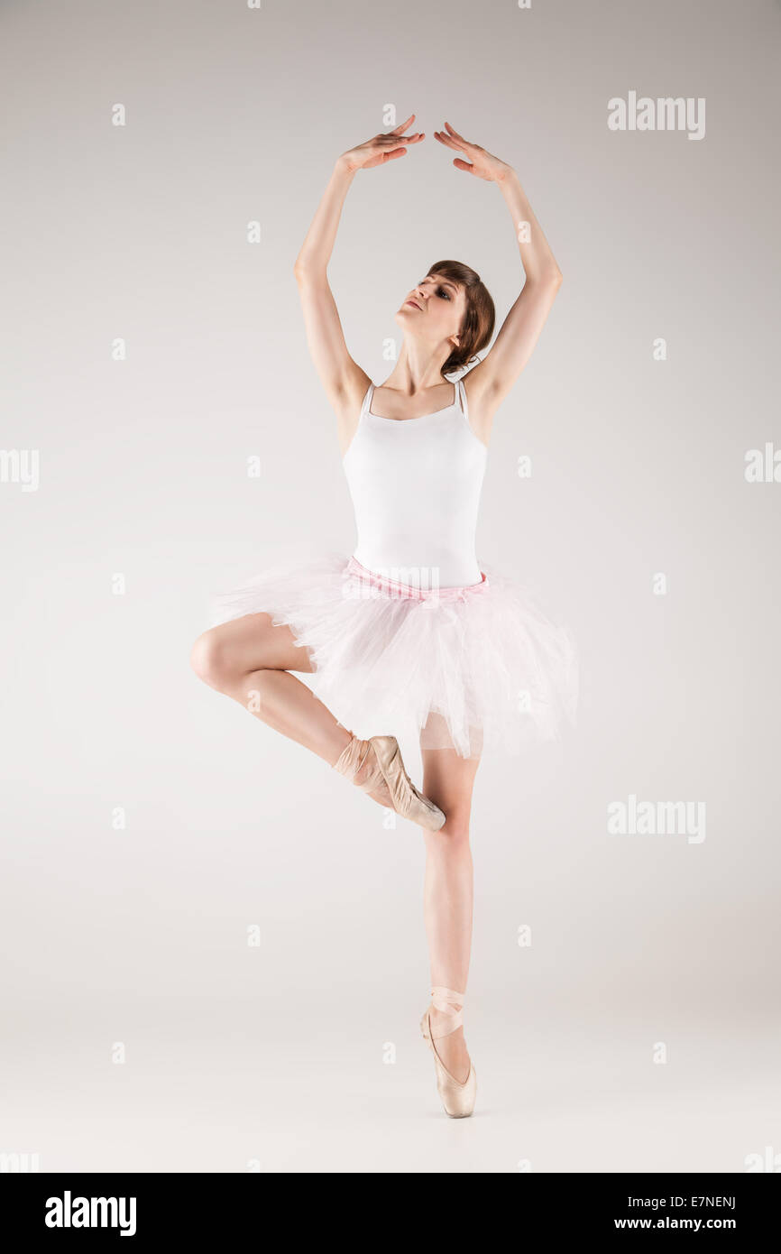 Ballet dancer in white tutu posing Stock Photo - Alamy