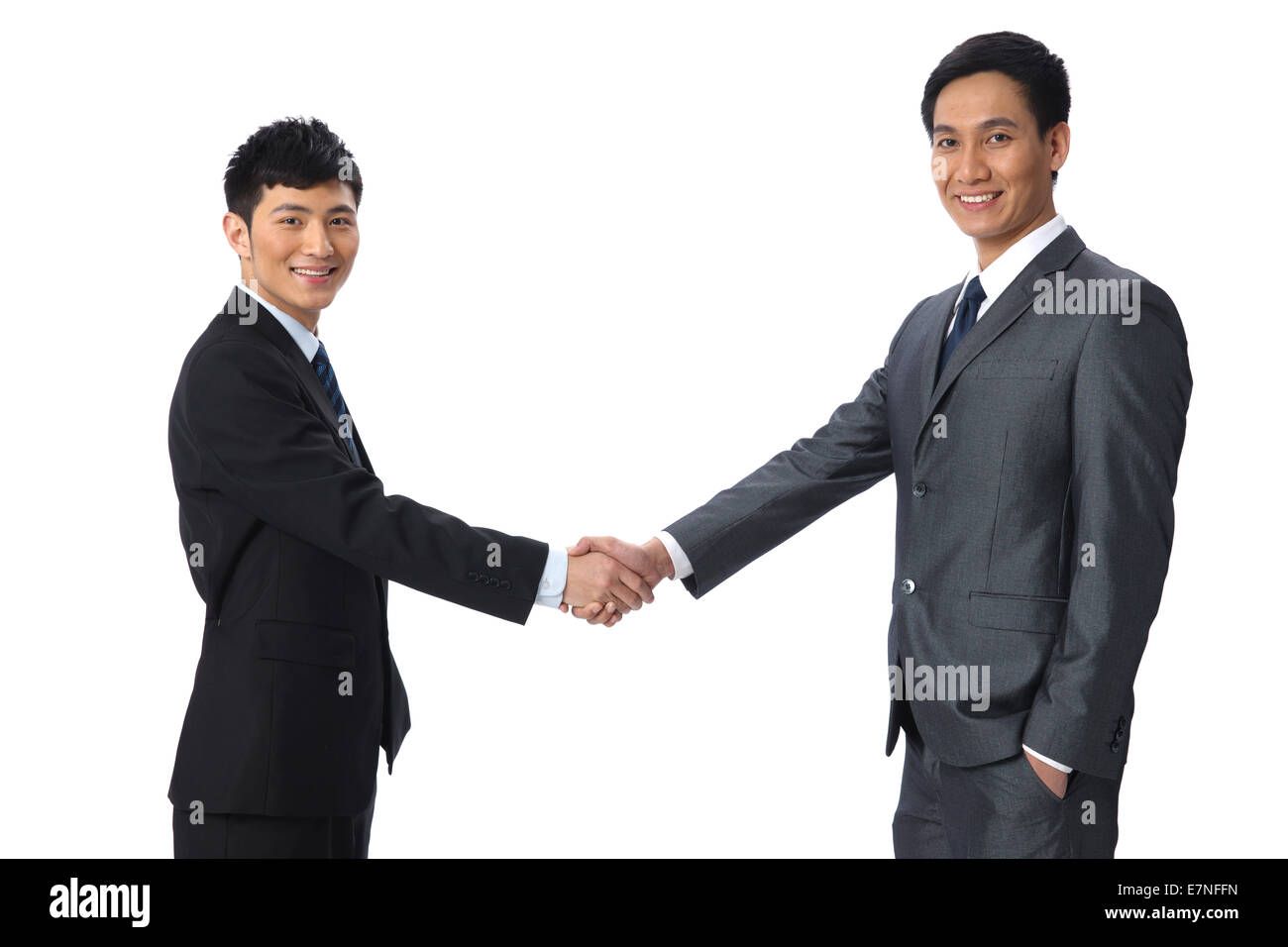 Celebration shaking hands Cut Out Stock Images & Pictures - Alamy