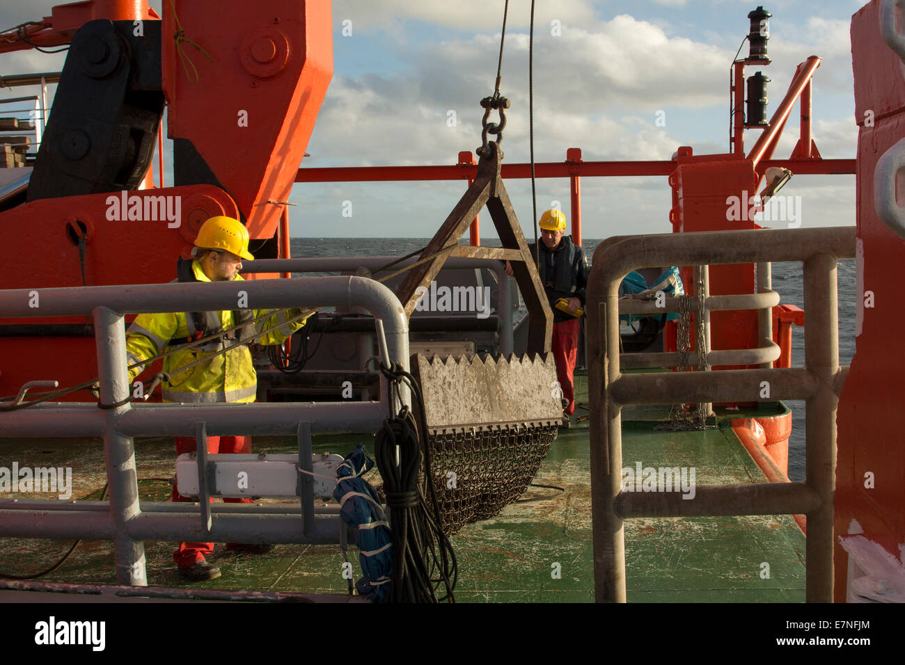 To pick up stones from deep submarine Walvis Ridge volcanoes the crew ...