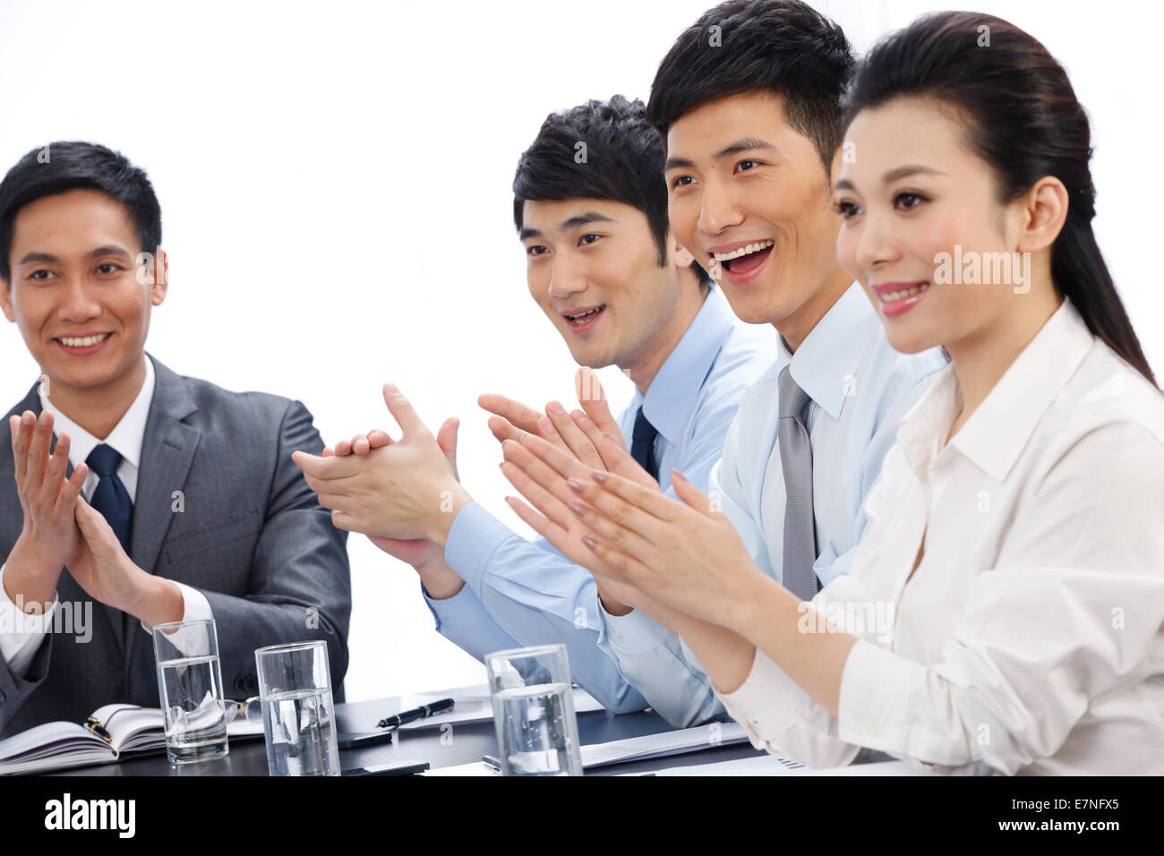 Cheerful chinese businesswoman applauding hi-res stock photography and ...