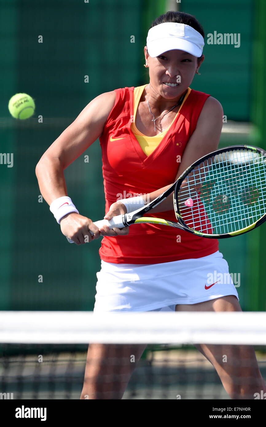 Incheon, South Korea. 22nd Sep, 2014. Zheng Jie of China returns the ...