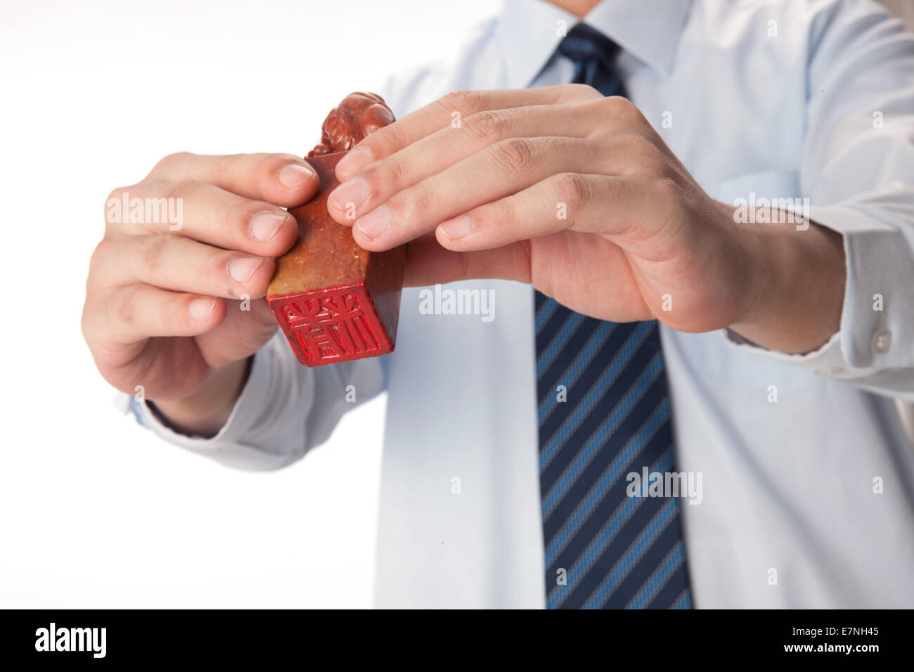 Man holding signet Stock Photo - Alamy
