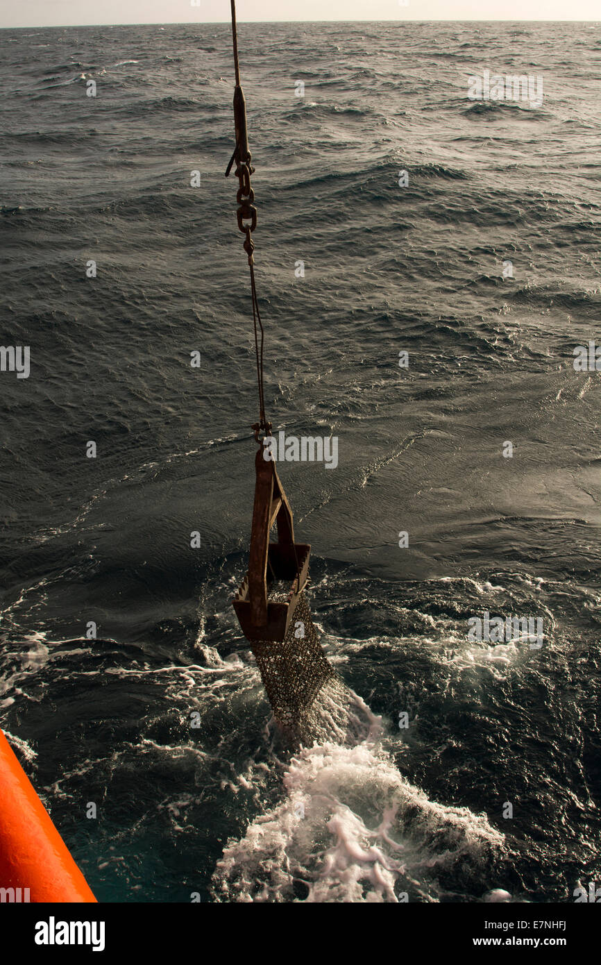 To pick up stones from deep submarine Walvis Ridge volcanoes the crew ...