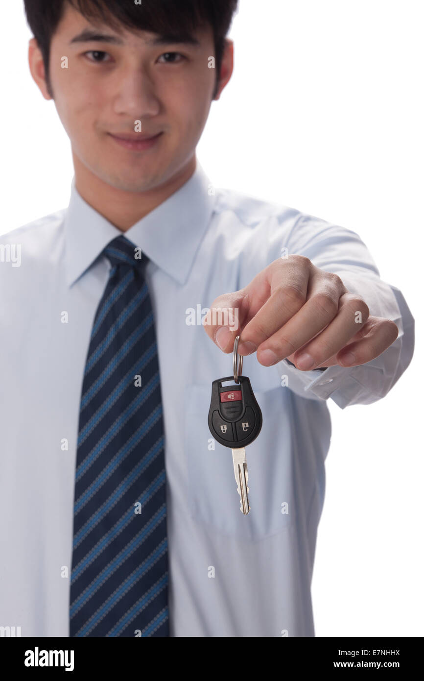 Man holding key Stock Photo - Alamy
