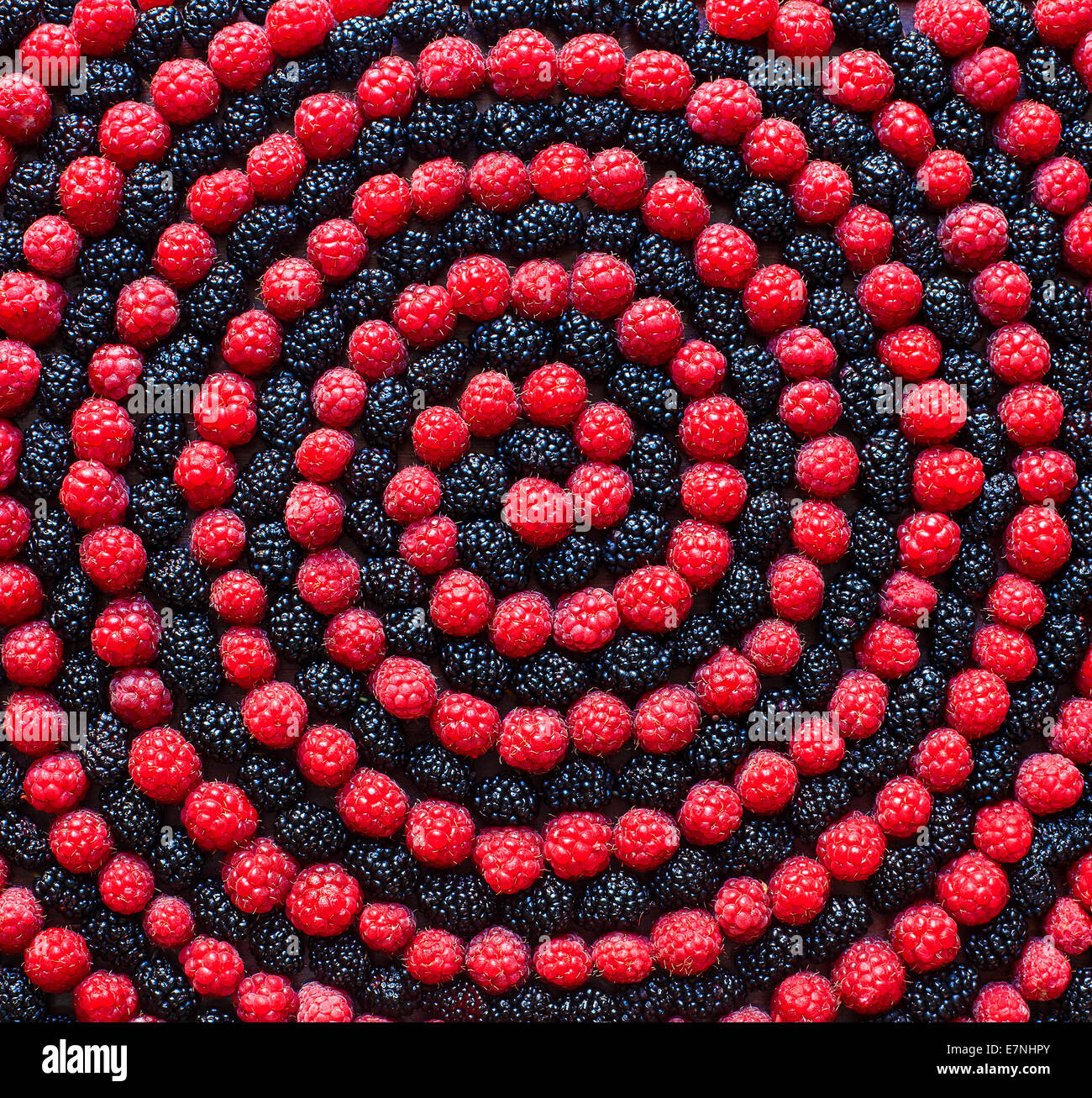 Colorful striped spiral of raspberry and mulberry Stock Photo - Alamy