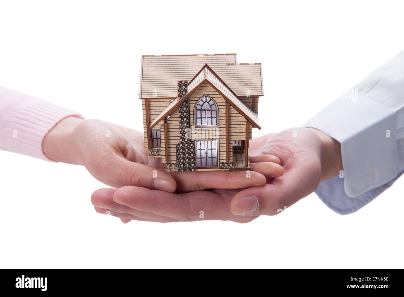 Hand holding house model Stock Photo - Alamy