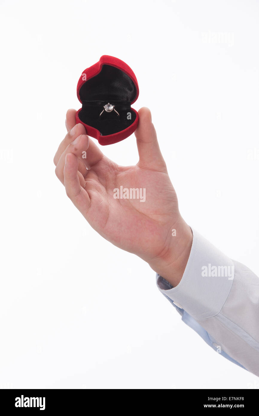 Man holding ring Stock Photo - Alamy