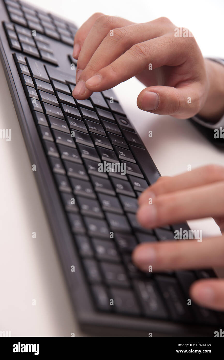 Fingers typing computer keyboard Stock Photo - Alamy