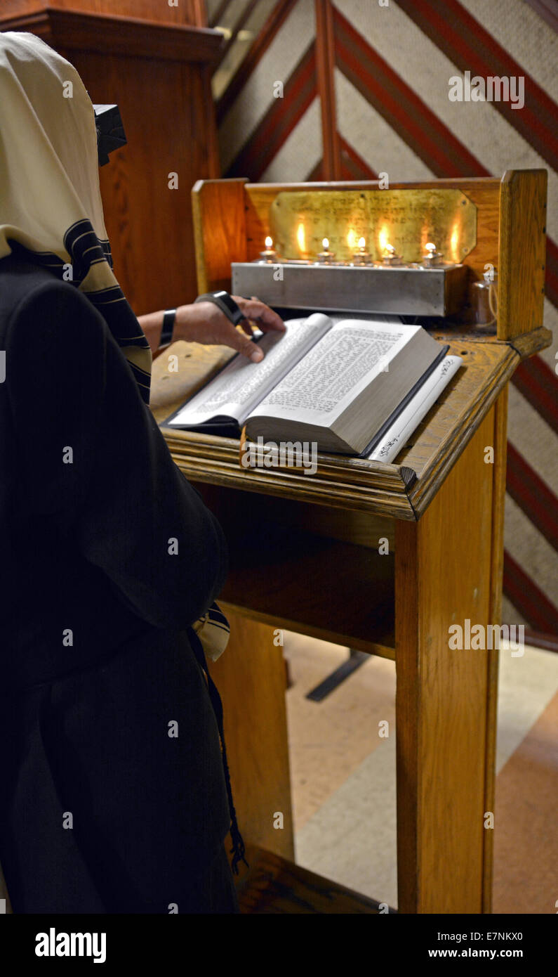 Religious Jewish man leading morning services at a synagogue in ...