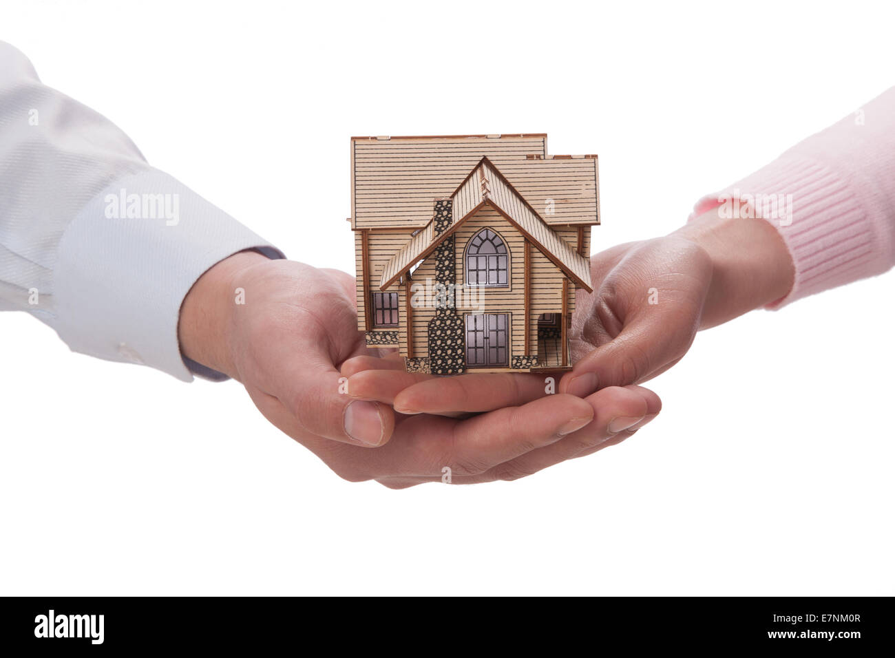 Hand holding house model Stock Photo - Alamy