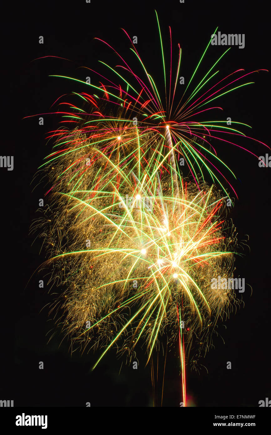 Multiple fireworks exploding in the night's sky Stock Photo - Alamy