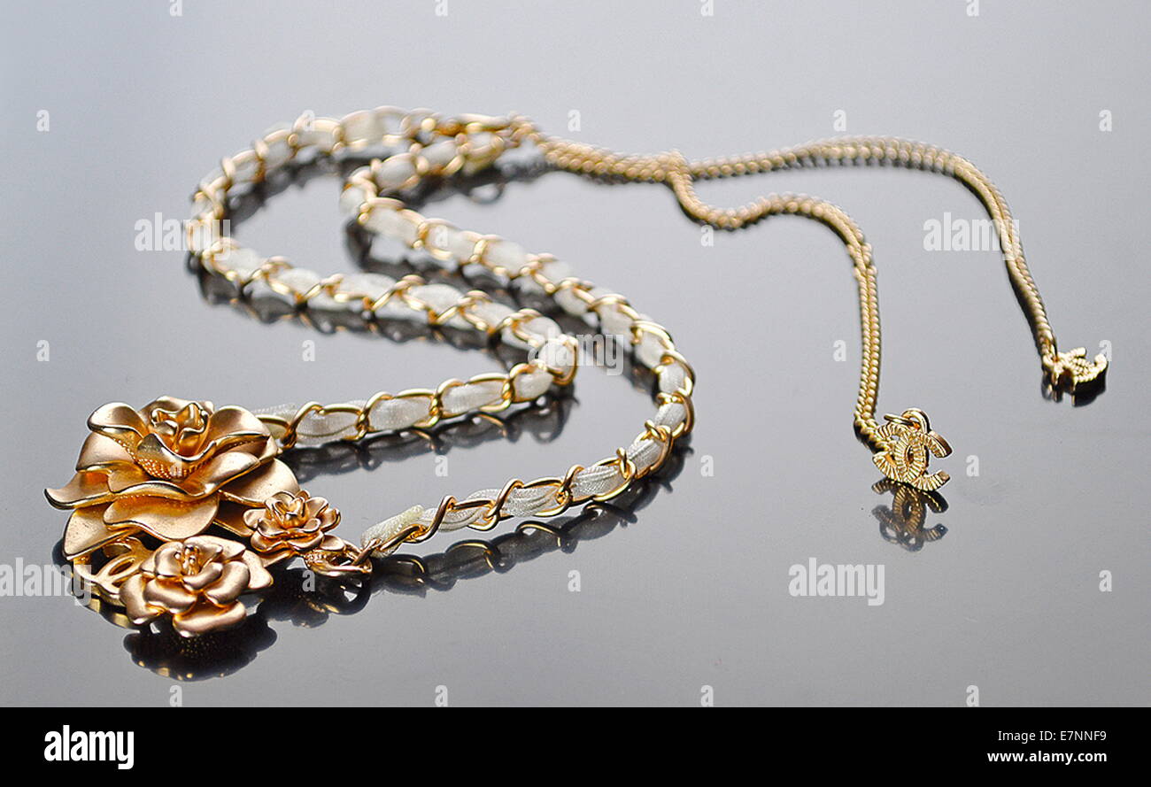 Metallic necklace hi-res stock photography and images - Alamy
