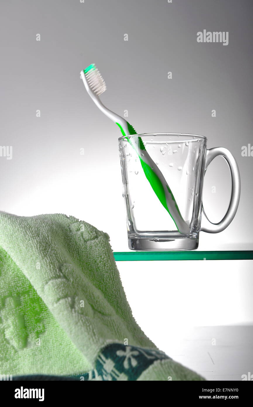 Toothbrush and cup Stock Photo - Alamy