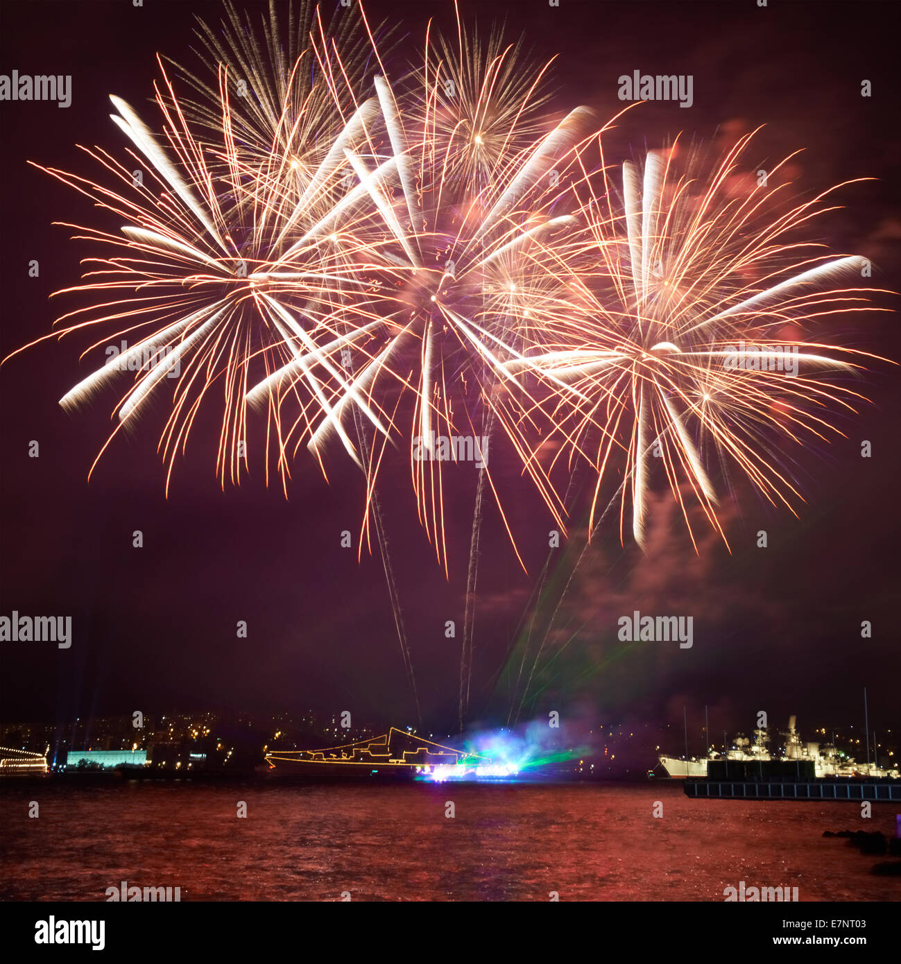 Red colorful fireworks on the black sky background Stock Photo - Alamy