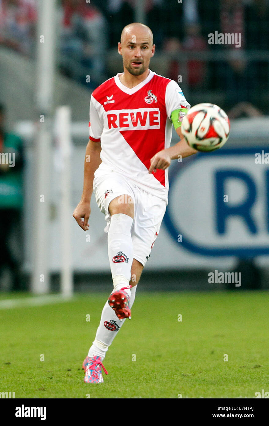 Cologne, Germany. 21st Sep, 2014. Cologne's Miso Brecko controls the ...
