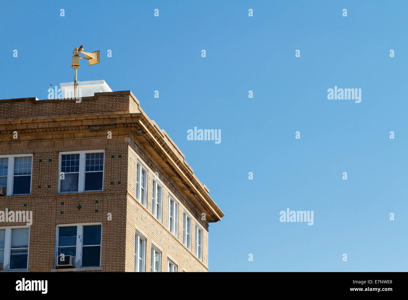 Top corner of an old building in a small town downtown area in the ...