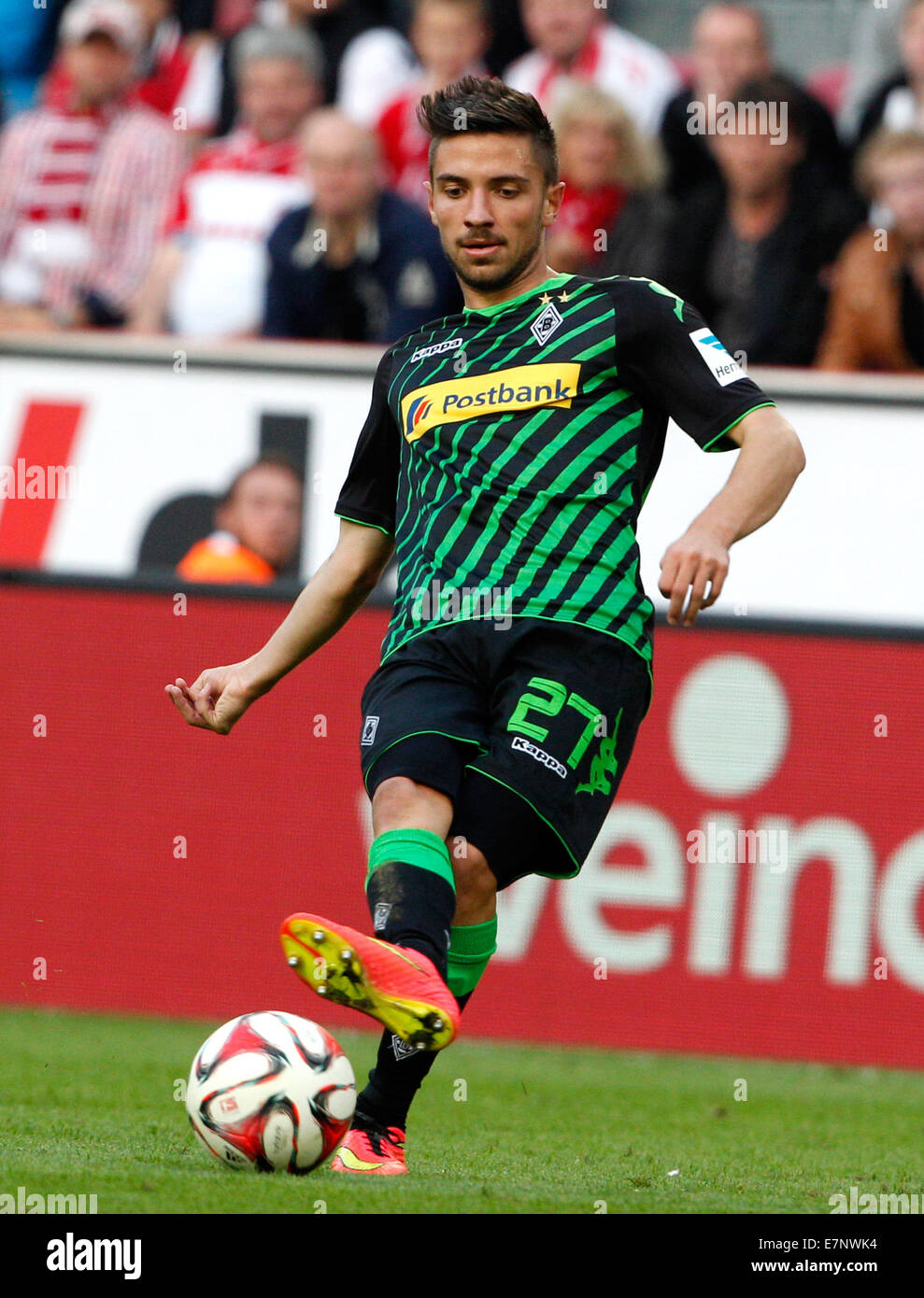 Cologne, Germany. 21st Sep, 2014. Moenchengladbach's Julian Korb ...