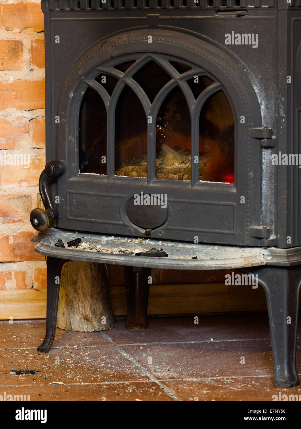 Winter at home. Closeup of fireplace with fire flame interior. Heating ...