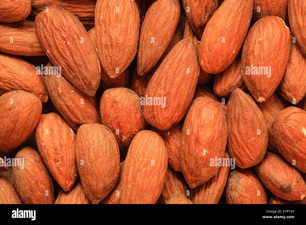 Healthy food, good for heart health. Almonds as background Stock Photo ...