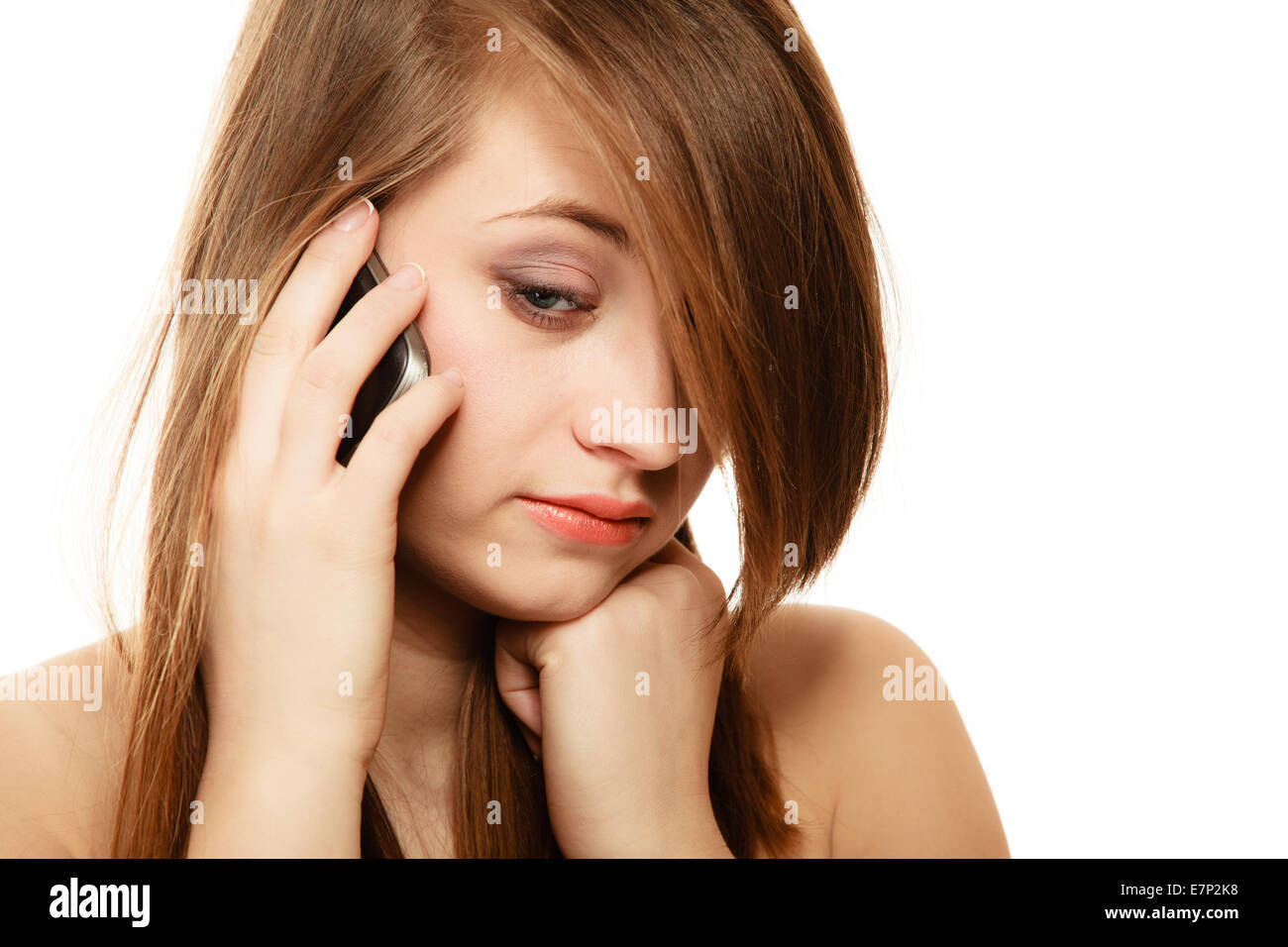 Communication technology. Sad upset girl unhappy young woman talking on ...