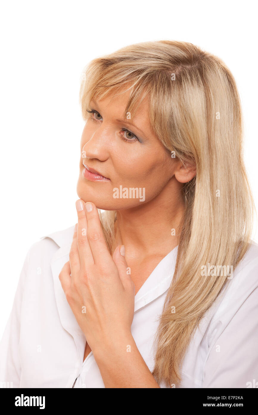 Thoughtful thinking mature woman portrait. Isolated on white background ...