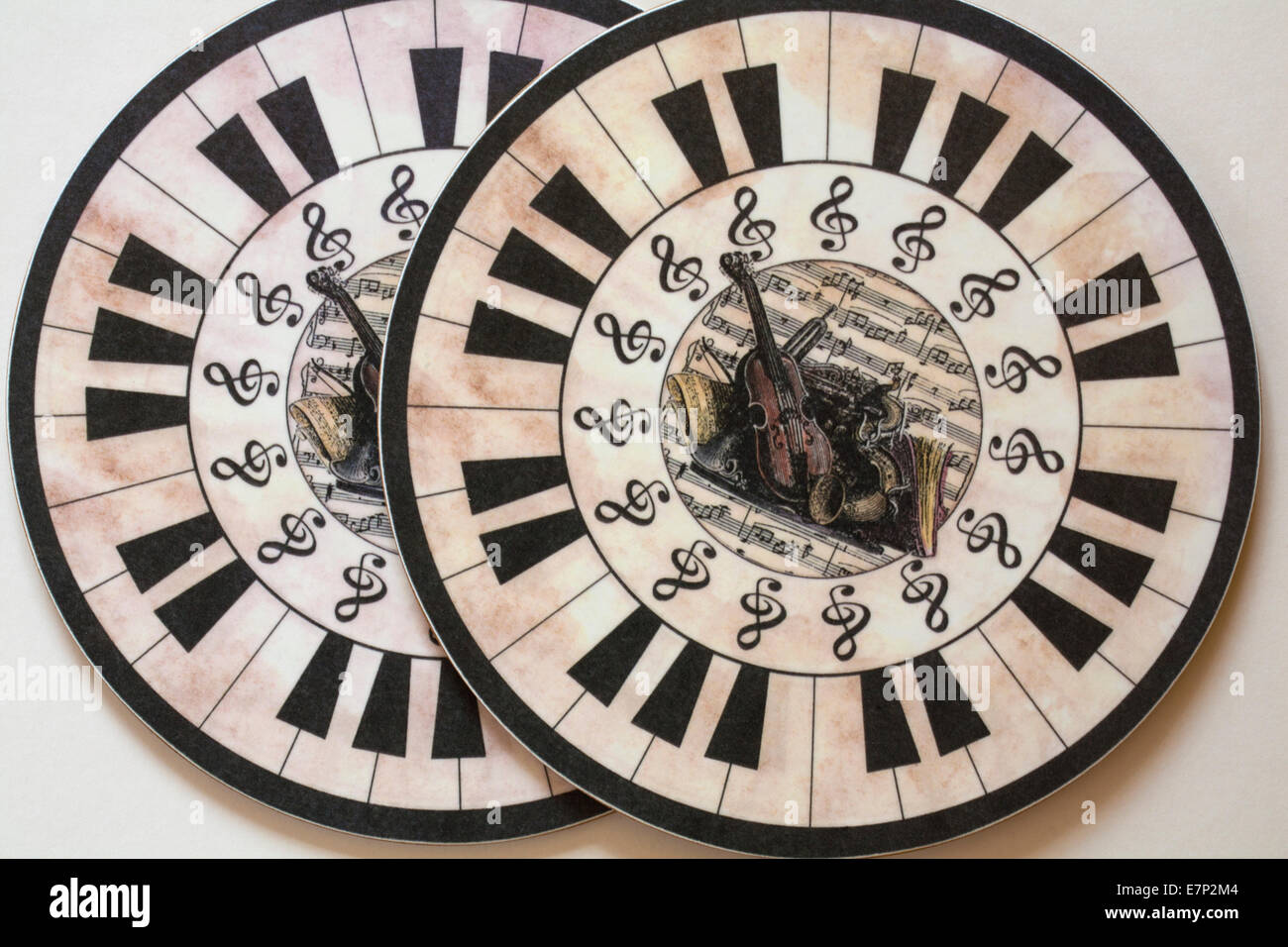 music coasters set on white background Stock Photo - Alamy