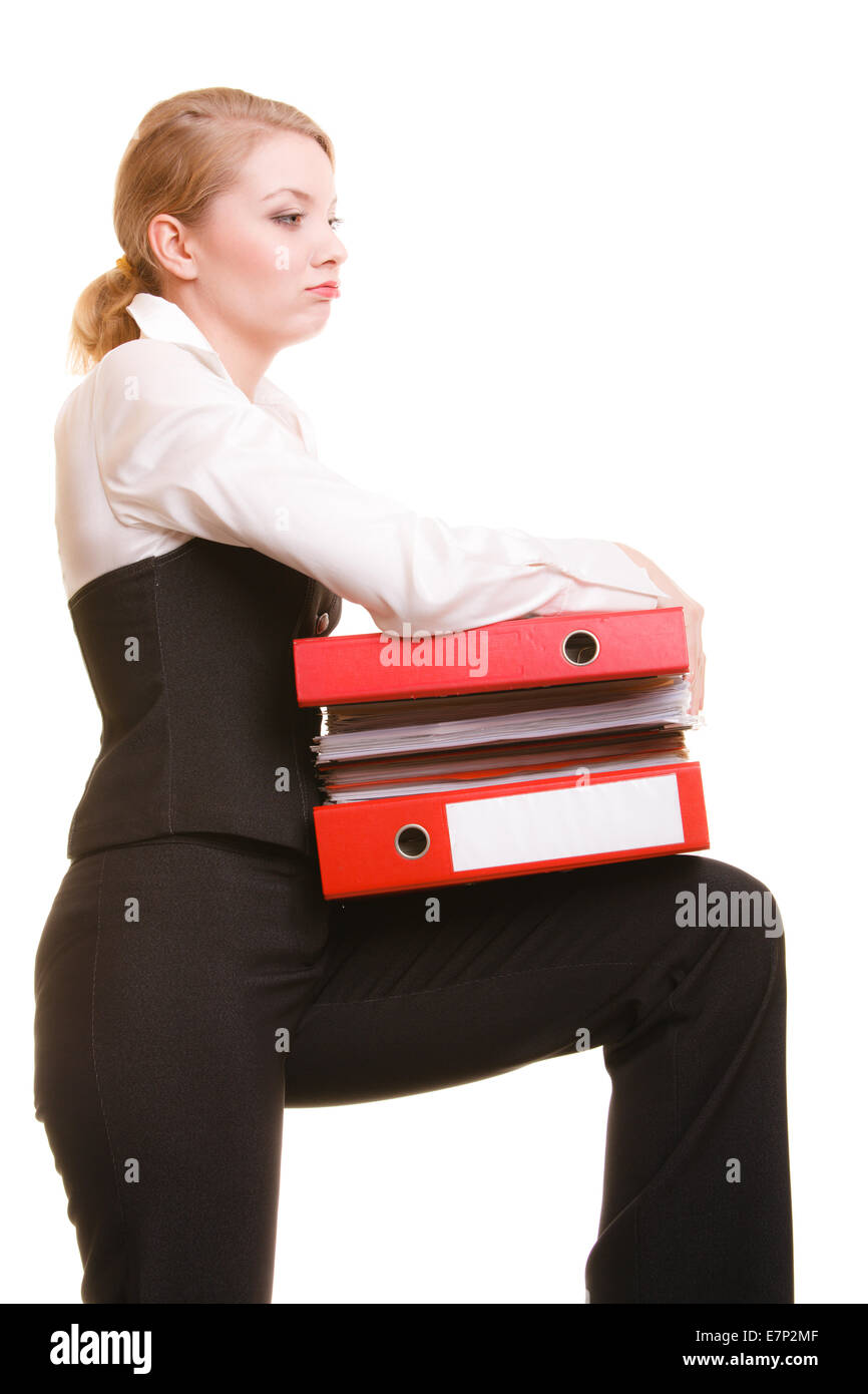 Business and paperwork. Young overworked businesswoman holding stack of ...