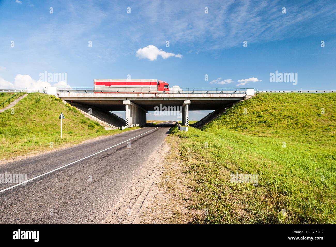 Bridge over the rural road Stock Photo - Alamy