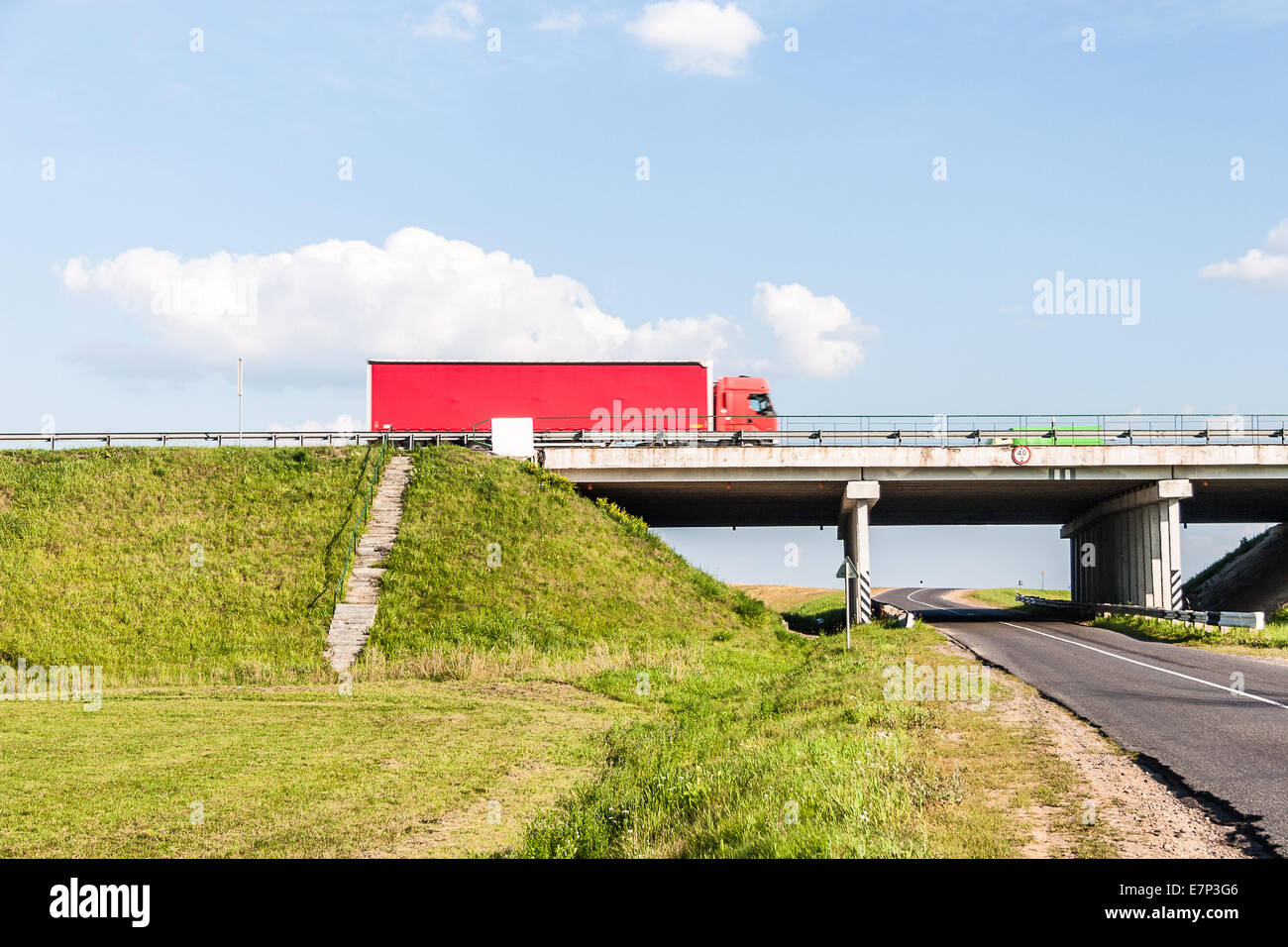 Bridge over the rural road Stock Photo - Alamy