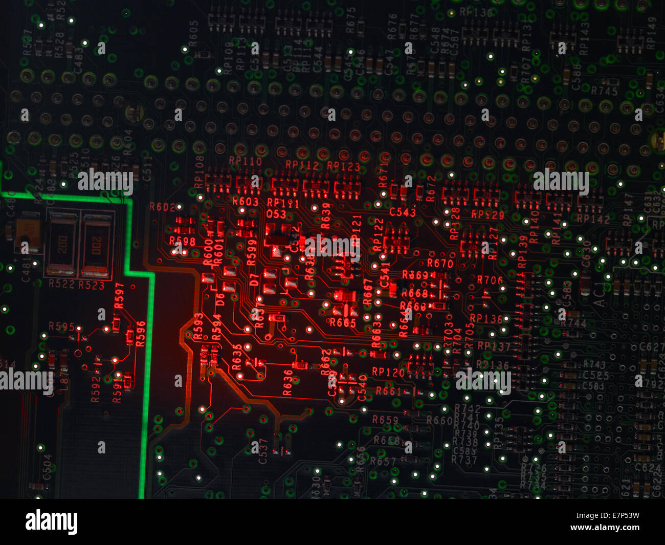 full frame detail of a red illuminated printed circuit board Stock ...