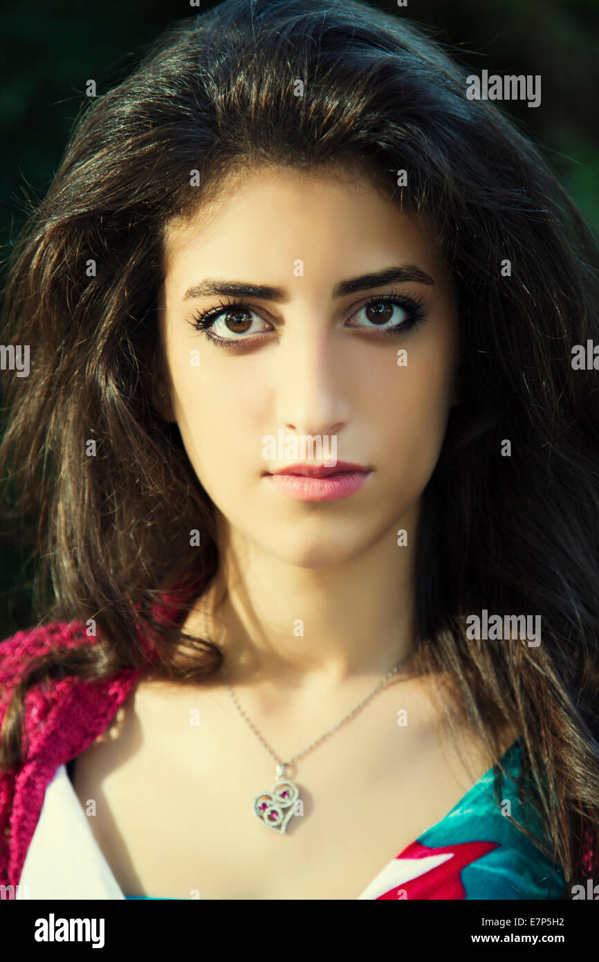 Beautiful young woman staring Stock Photo - Alamy