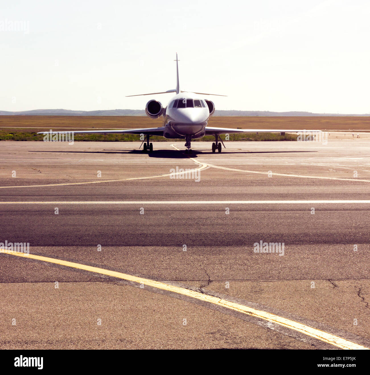 parked private airplane on the runway. white civic jet Stock Photo - Alamy