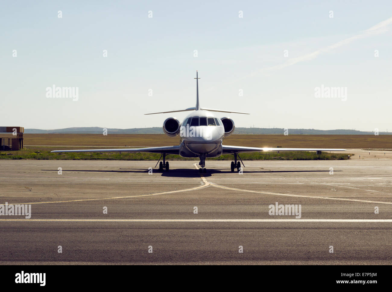 parked private airplane on the runway. white personal jet Stock Photo ...