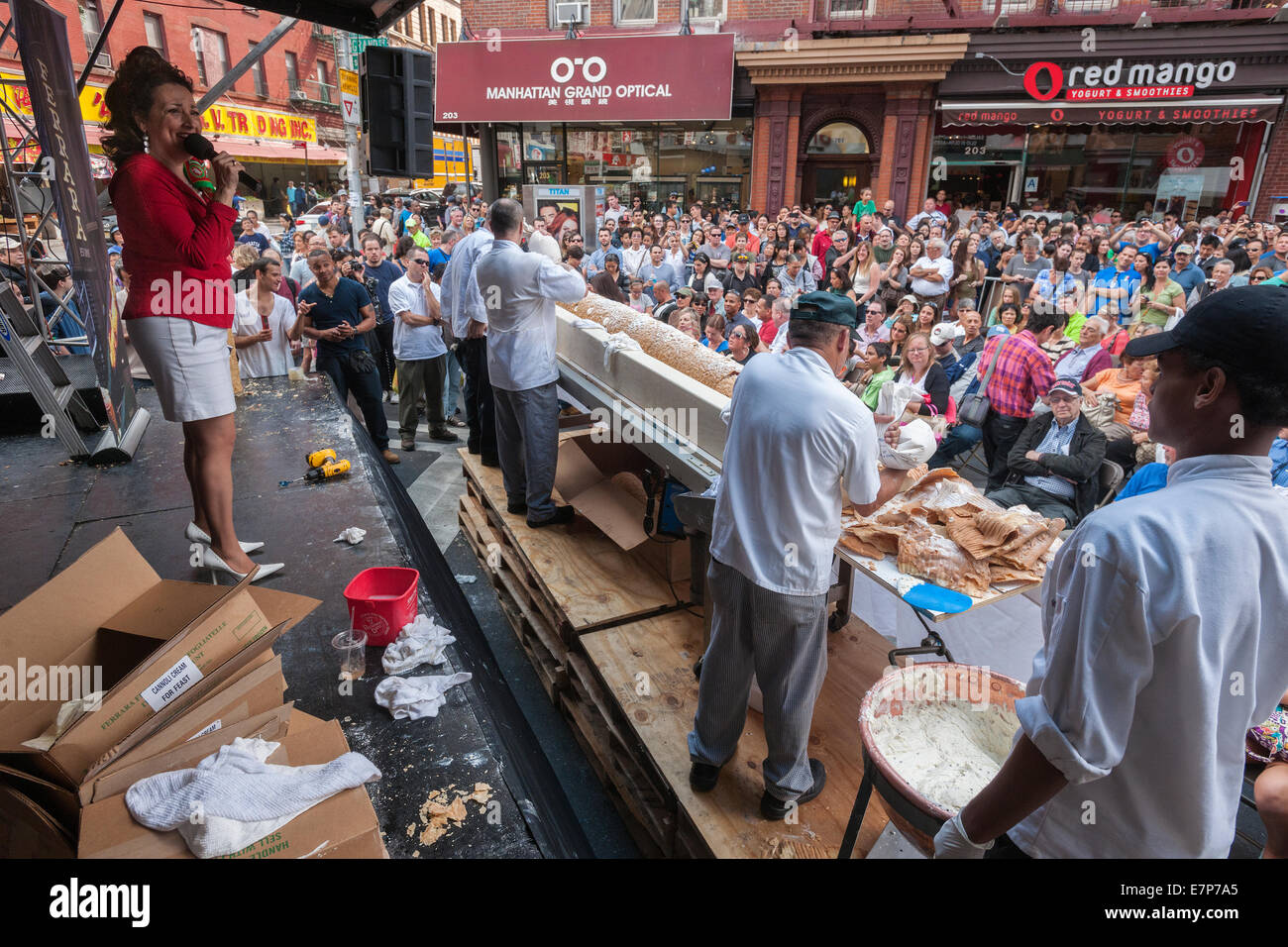 Cristina Fontanelli, left, entertains the assembled crowd as workers ...