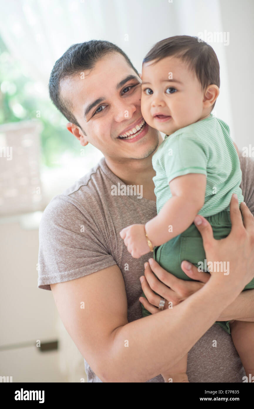 Father holding his son (6-11 months Stock Photo - Alamy