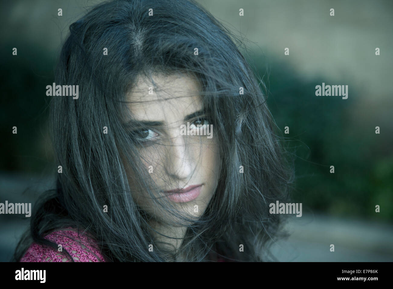 Young woman hair covering face Stock Photo - Alamy