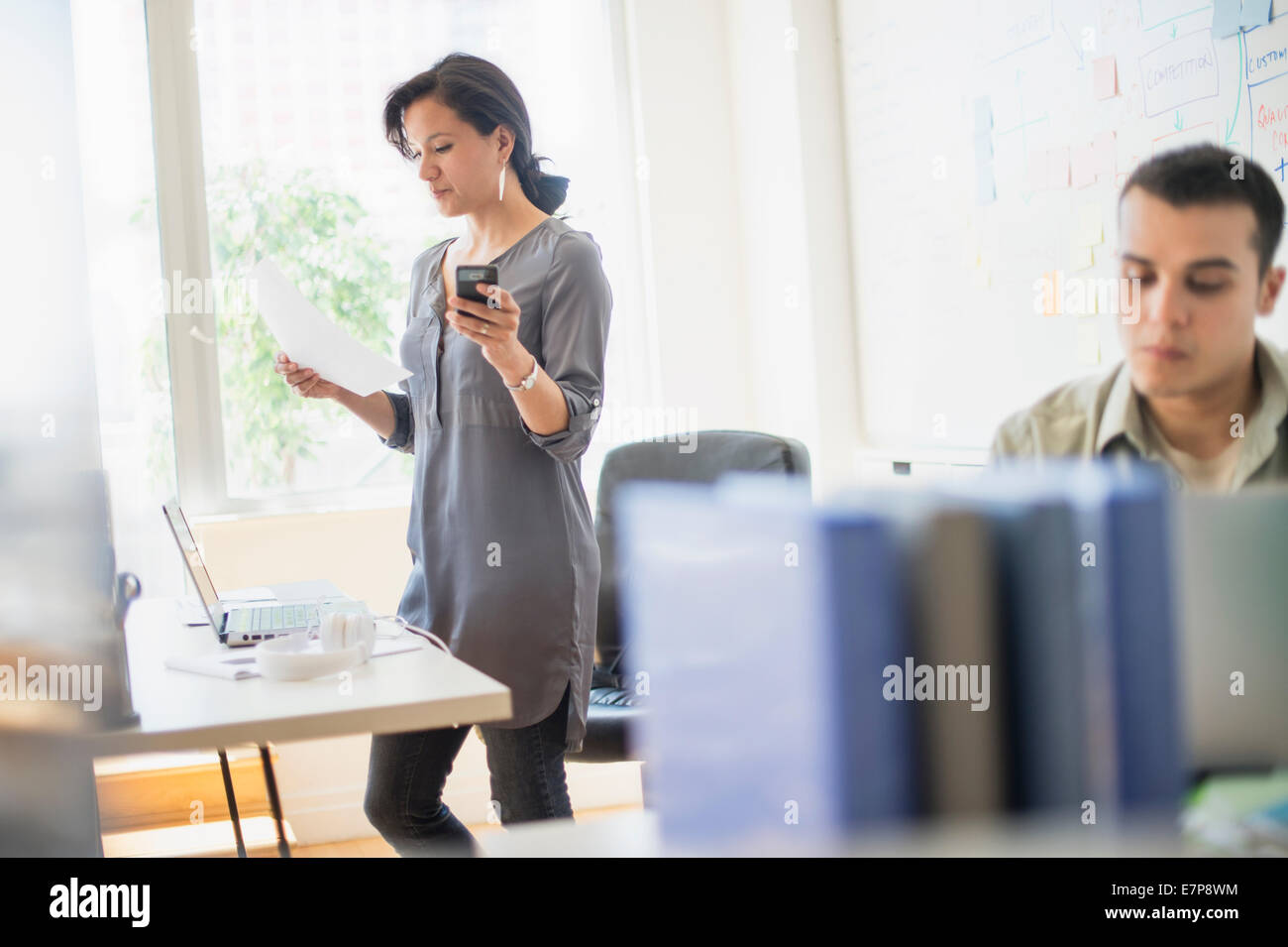 Couple working in office Stock Photo - Alamy