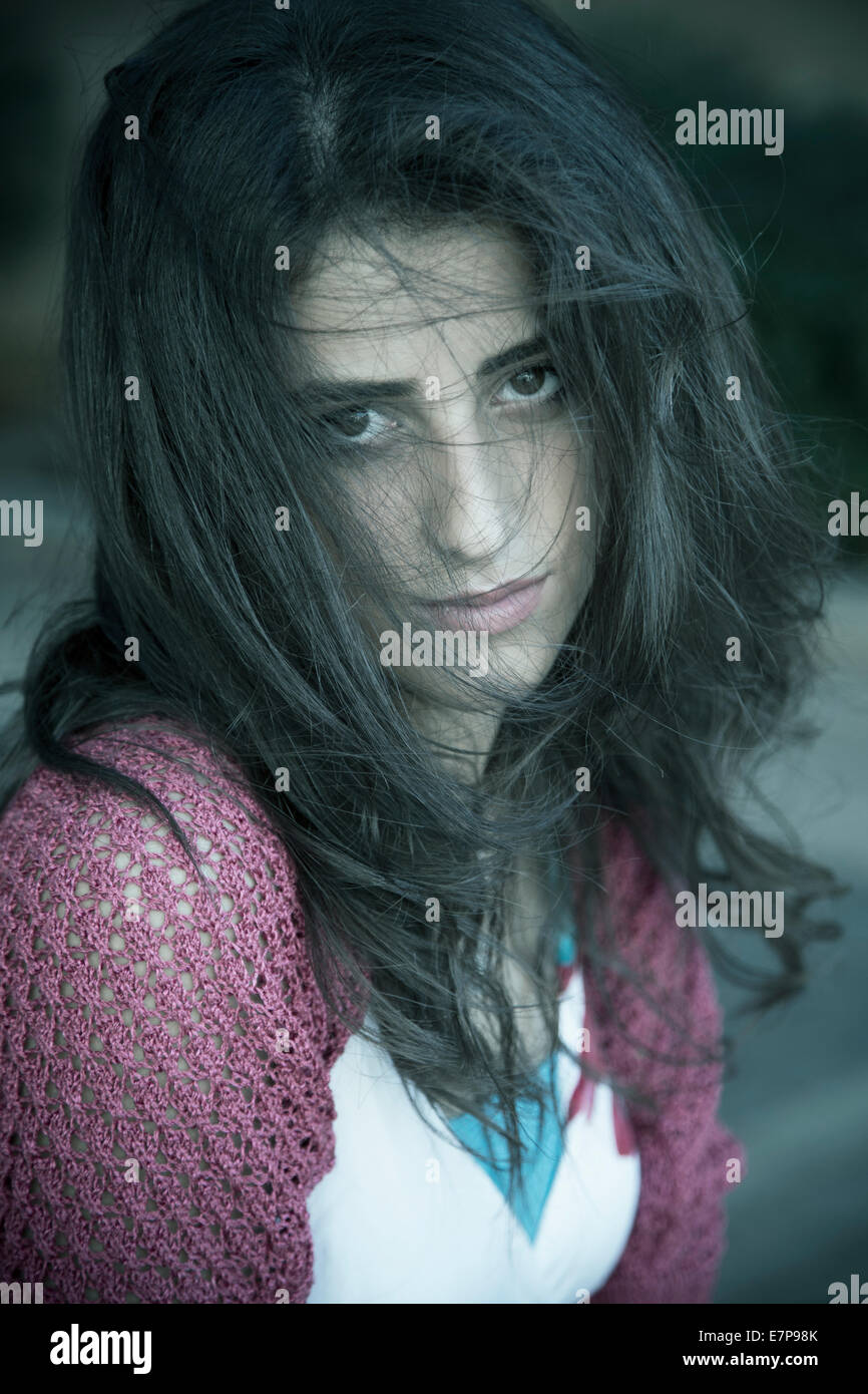 Young woman hair covering face Stock Photo - Alamy
