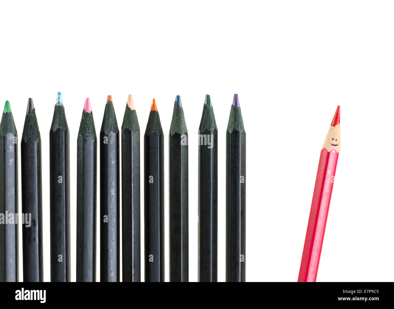 red pencil with black pencils Stock Photo - Alamy