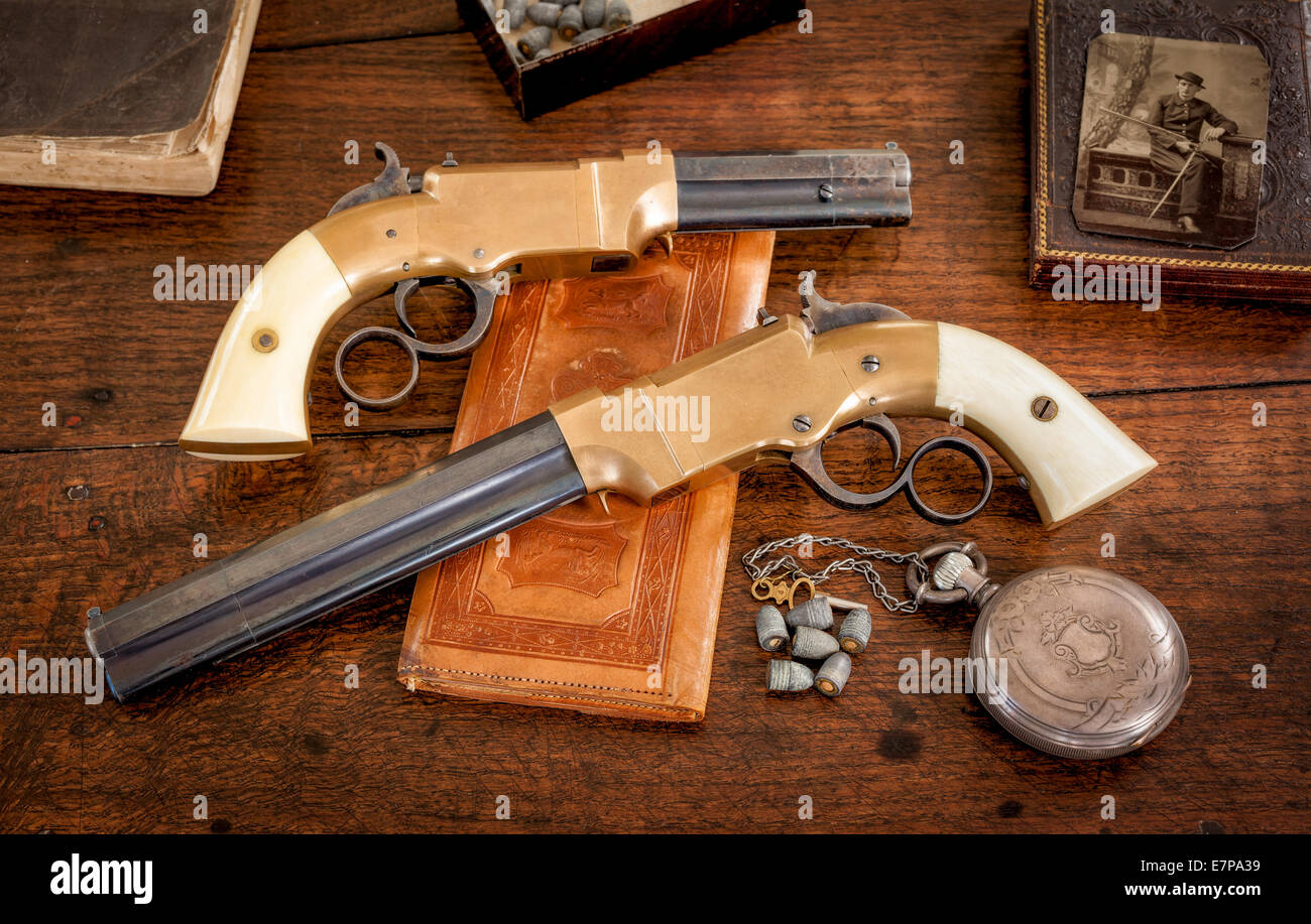 Beauty shot of a pair of ivory handled Volcanic firearms Stock Photo ...