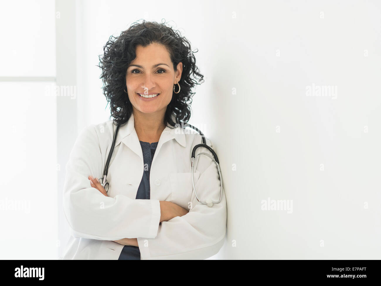 Portrait of smiling female doctor Stock Photo - Alamy