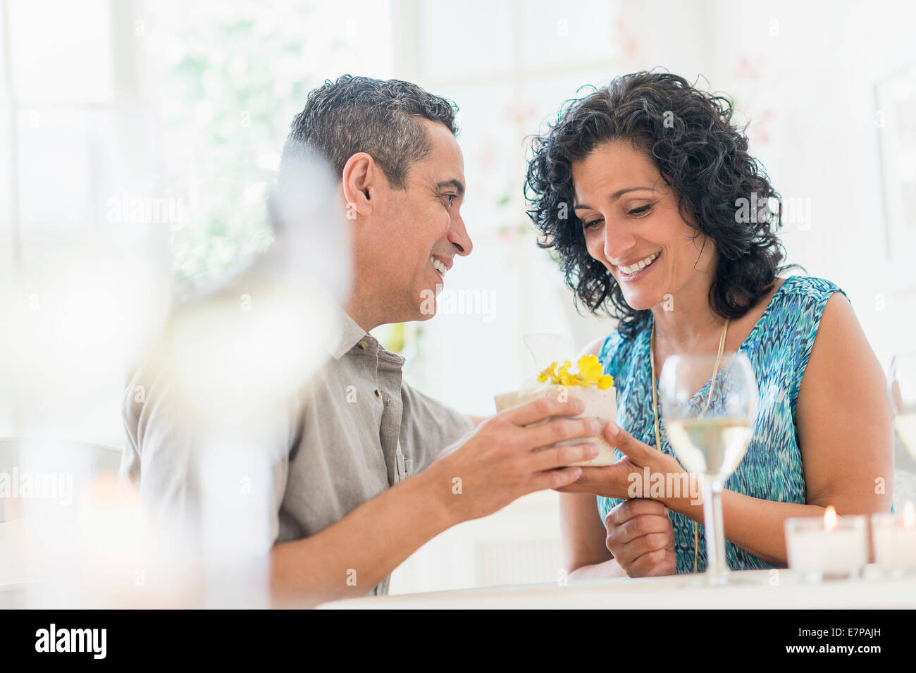 Couple celebrating anniversary in restaurant Stock Photo - Alamy
