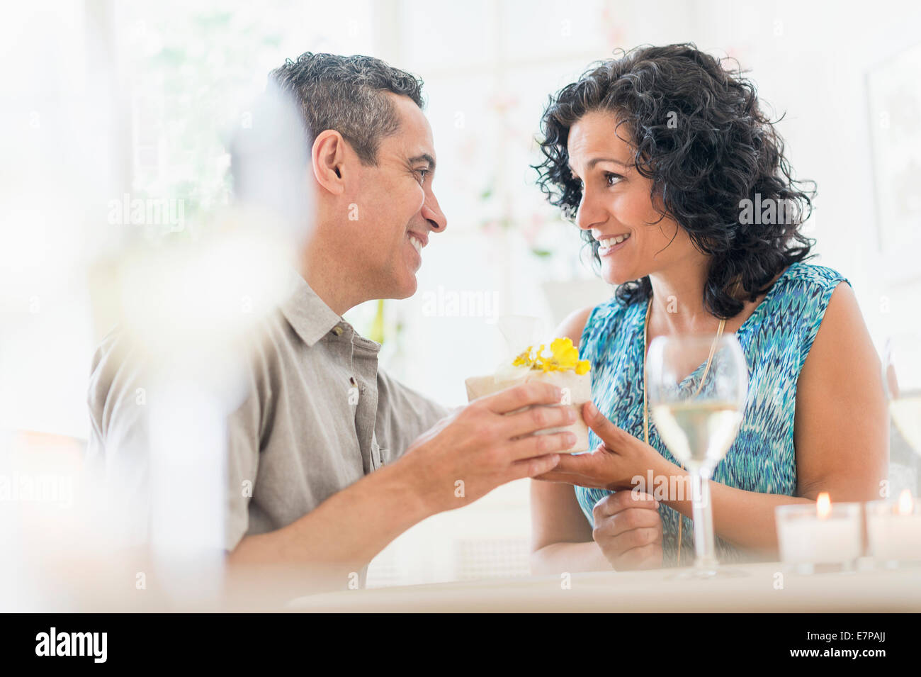 Couple celebrating anniversary in restaurant Stock Photo - Alamy
