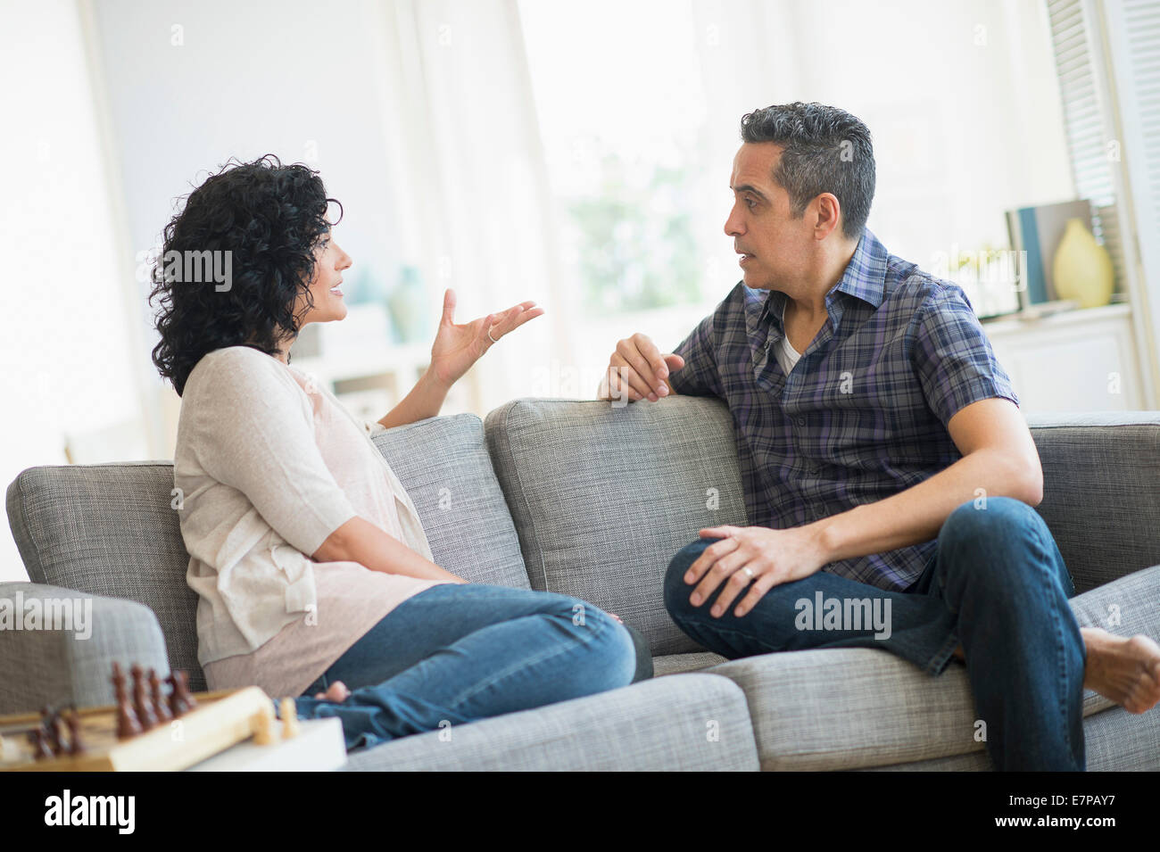 Two women talking sofa couch hi-res stock photography and images - Alamy