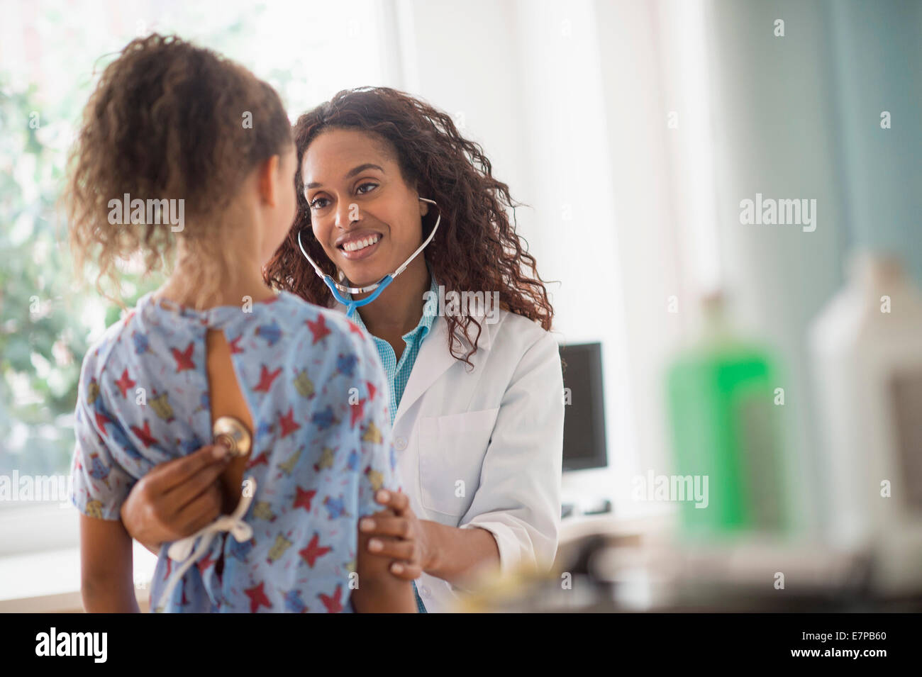 Friendly doctor examining patient hi-res stock photography and images ...