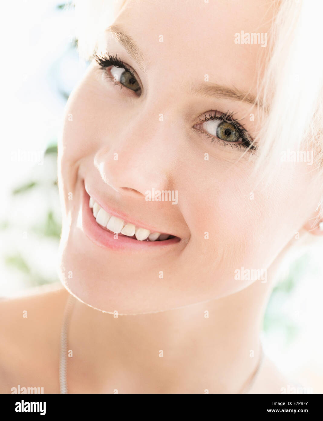 Portrait of blonde woman smiling Stock Photo - Alamy