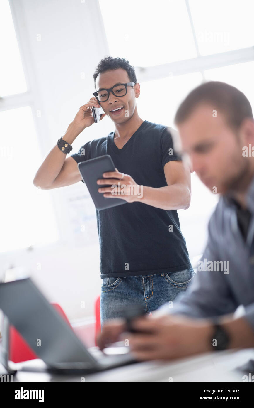 Men working in office Stock Photo - Alamy