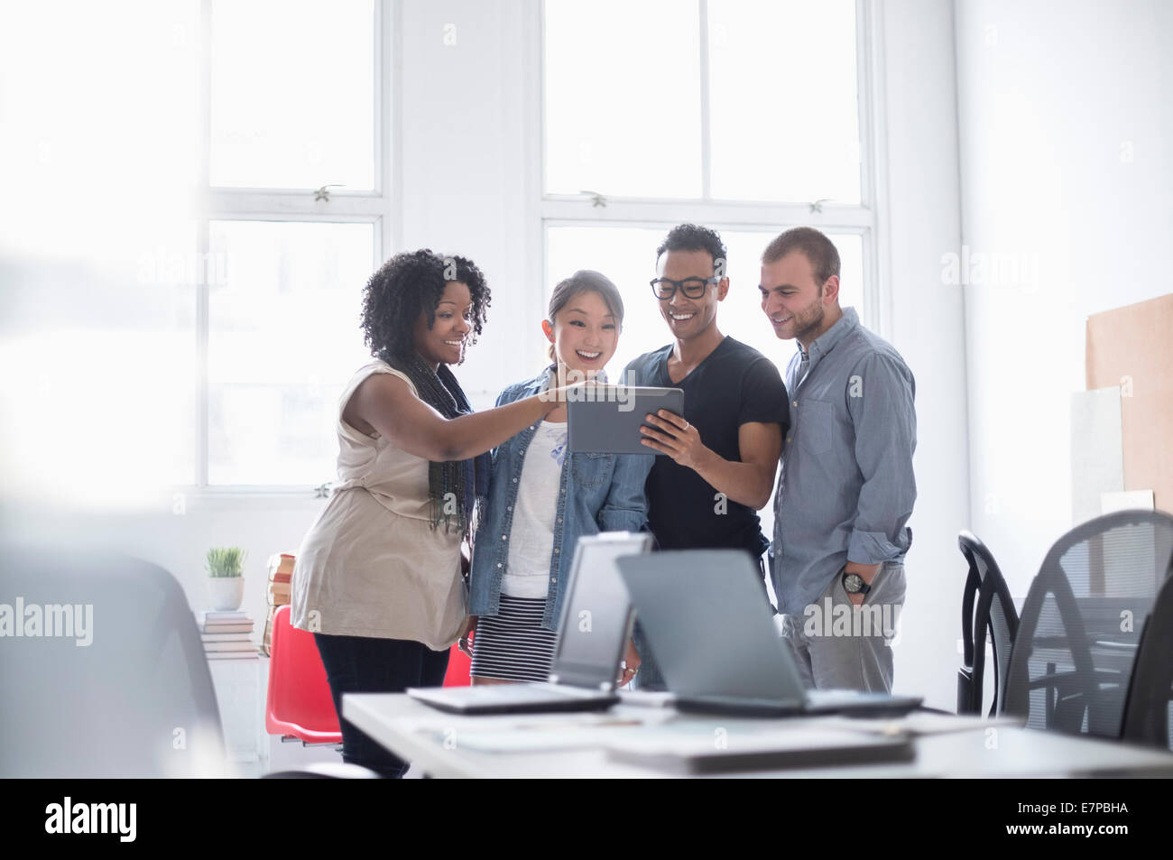 Women and men working in office Stock Photo - Alamy