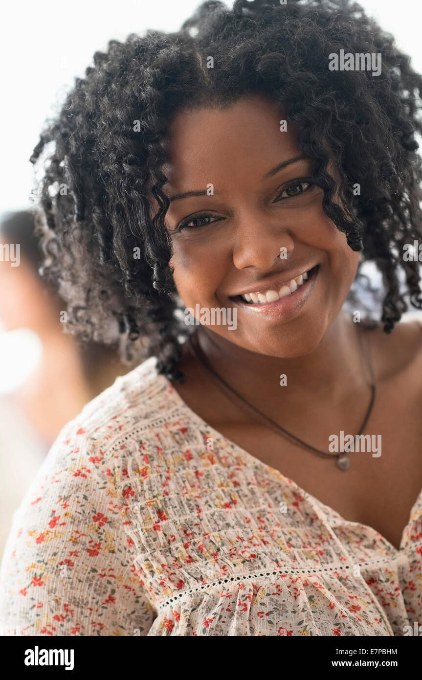 Portrait of smiling woman Stock Photo - Alamy